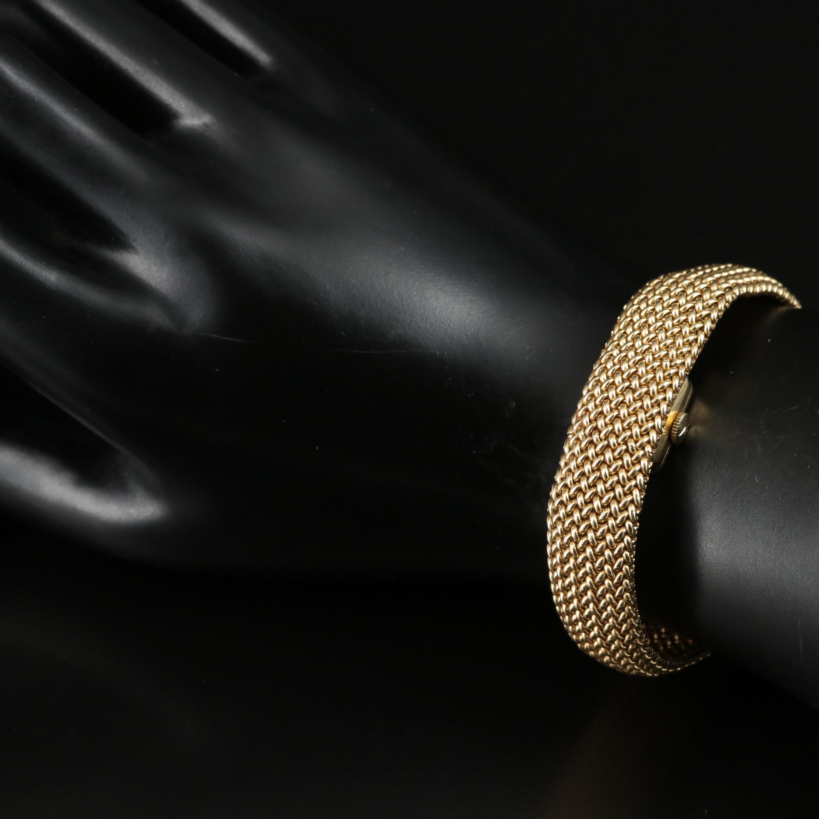 14K Movado Hidden Watch Dial Bracelet Wristwatch | EBTH