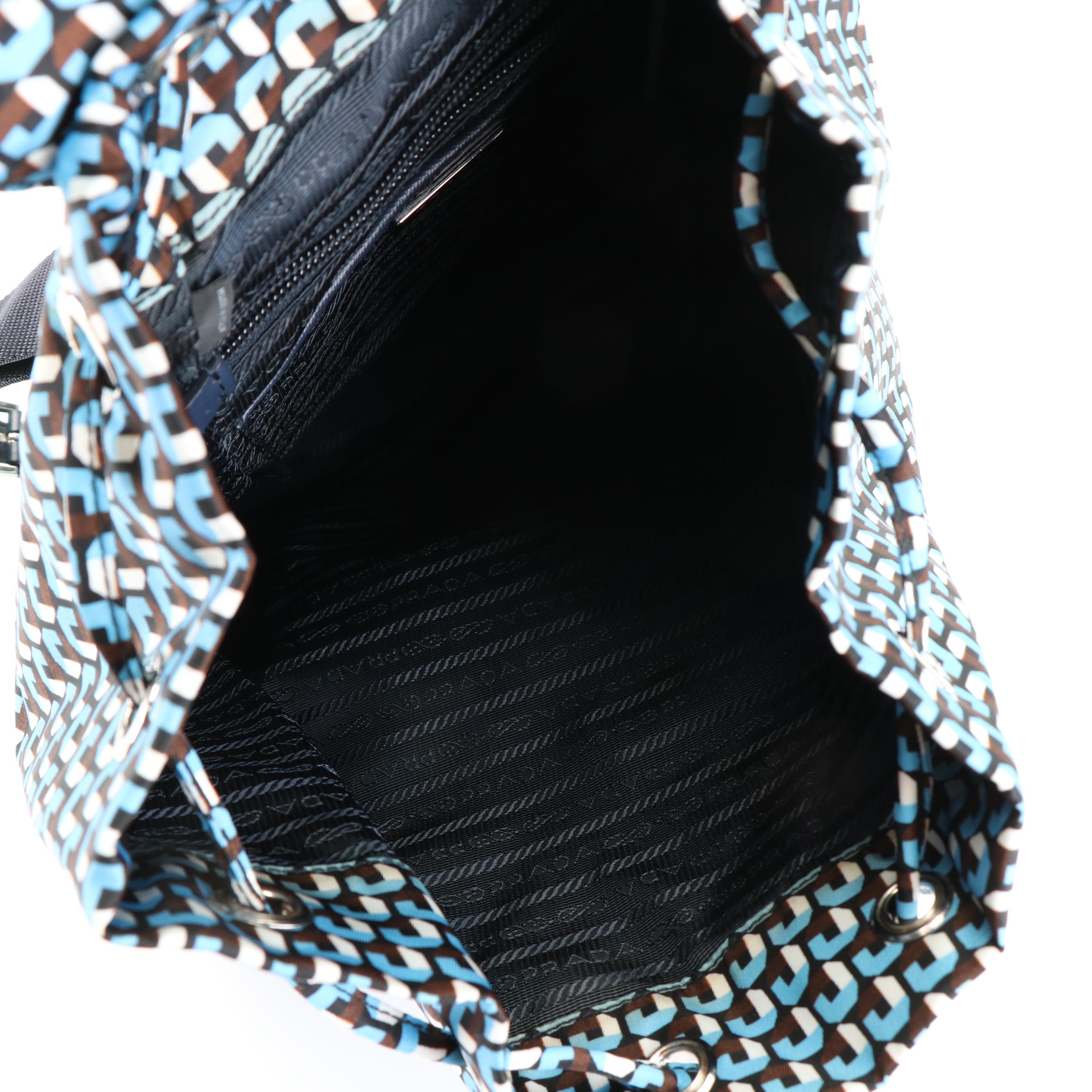 Prada Geometric Print Tessuto Nylon Drawstring Front Zip Backpack | EBTH
