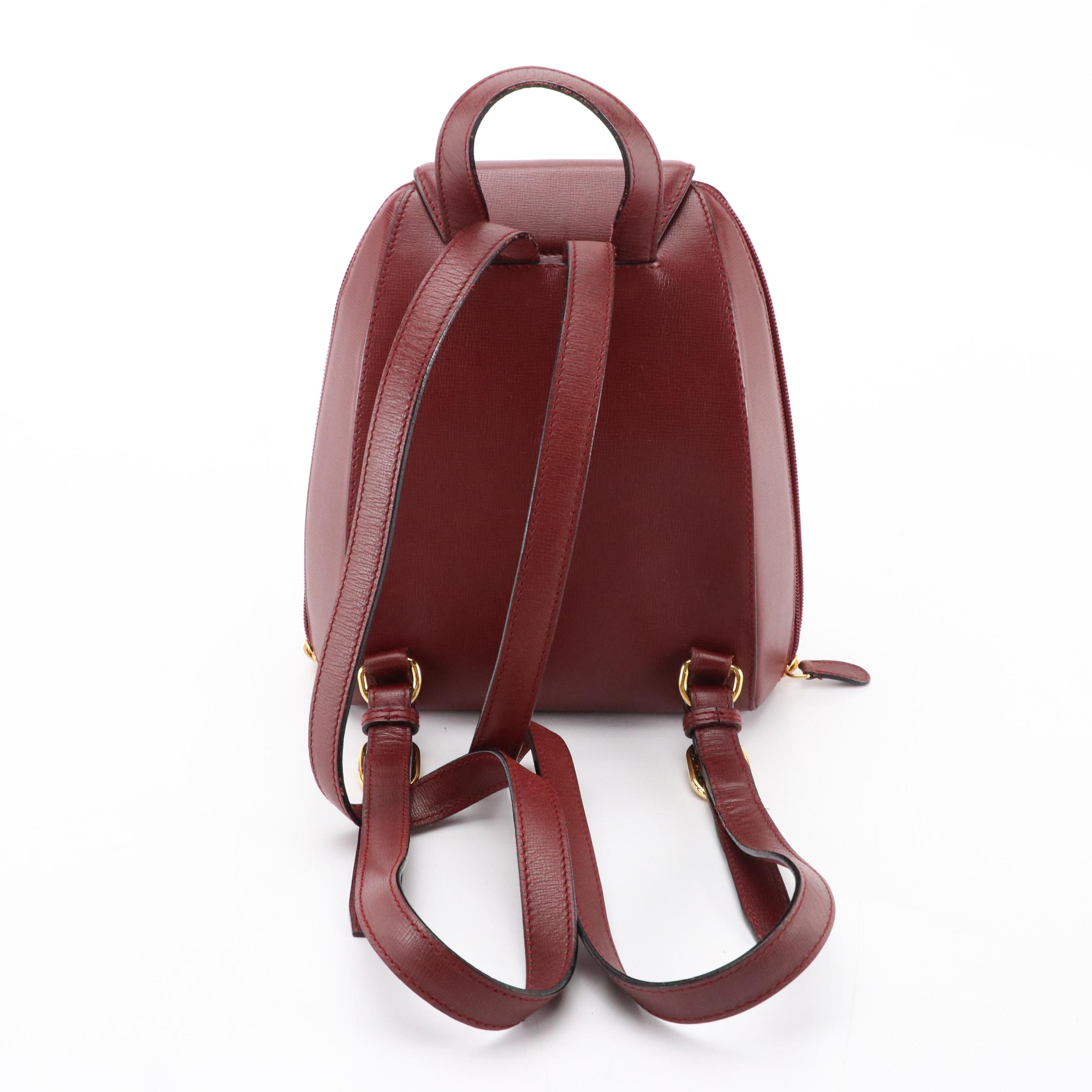 Cartier Must de Cartier Burgundy Leather Mini Backpack | EBTH
