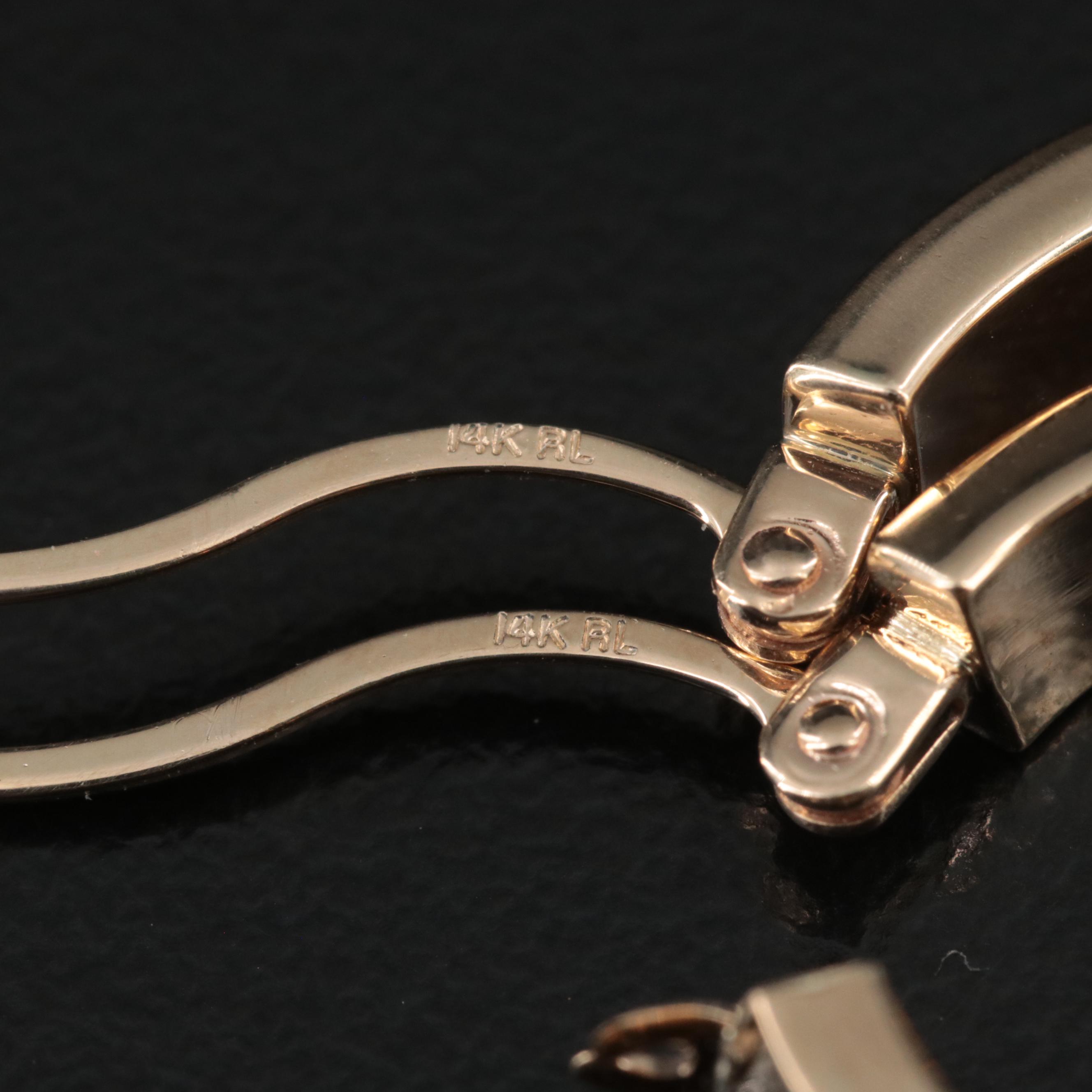 14K Oval Hoop Earrings with Diamond-Cut Finish | EBTH