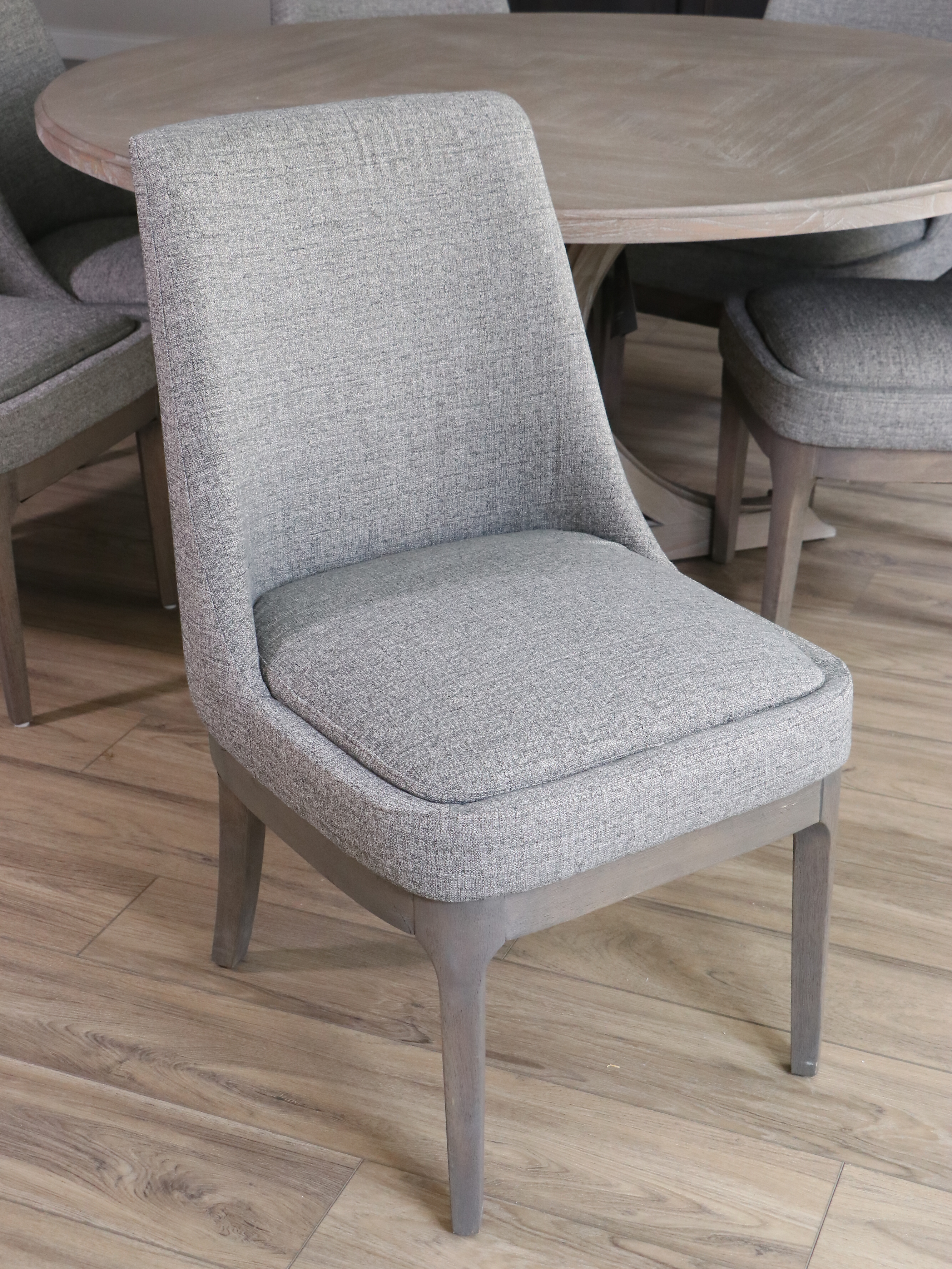 Gabby Round Dining Table with Six Dawson Upholstered Dining Chairs | EBTH