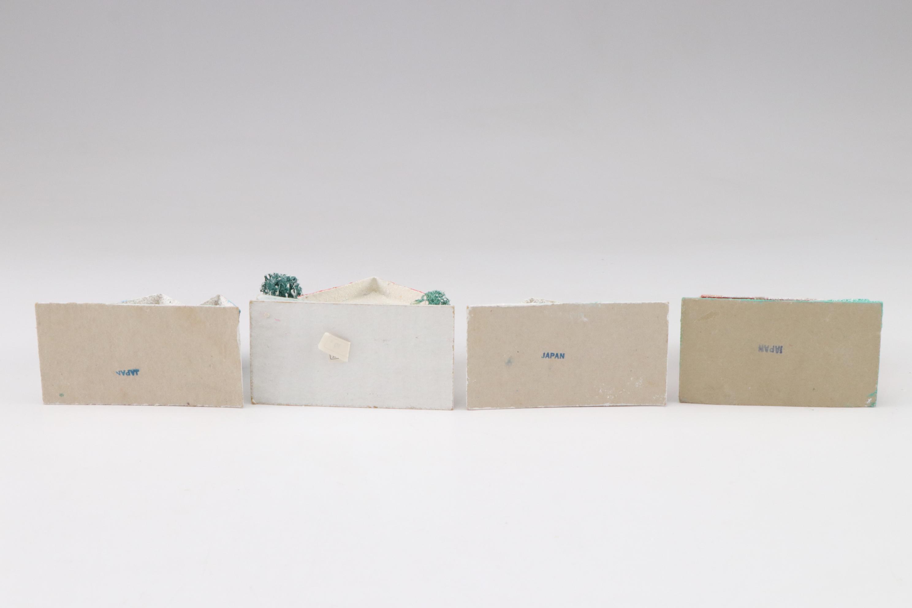 Assortment of Handmade Christmas Putz Houses | Everything But The House