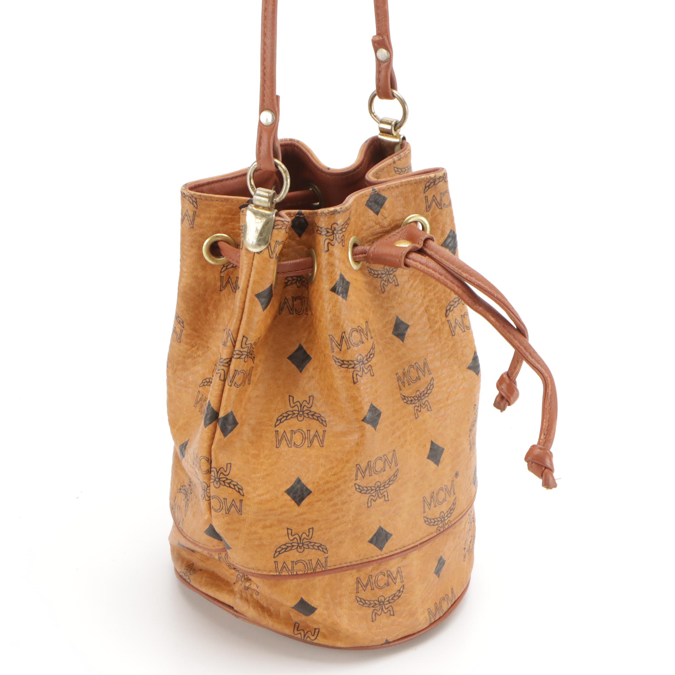 MCM Mini Drawstring Bucket Bag in Cognac Visetos Canvas with Leather ...