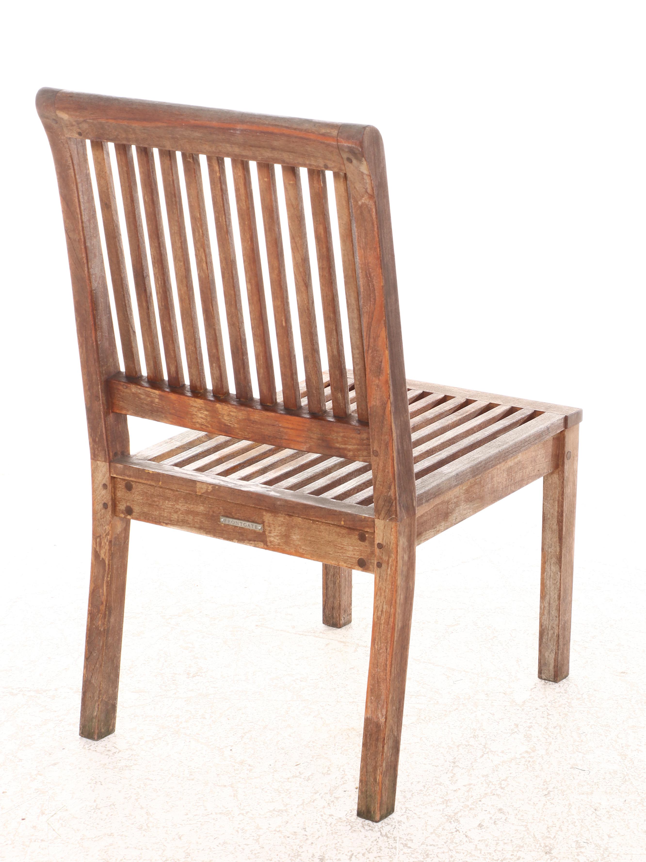 Frontgate Seven-Piece Teak Patio Dining Set with Umbrella and Sunbrella Cushions | EBTH