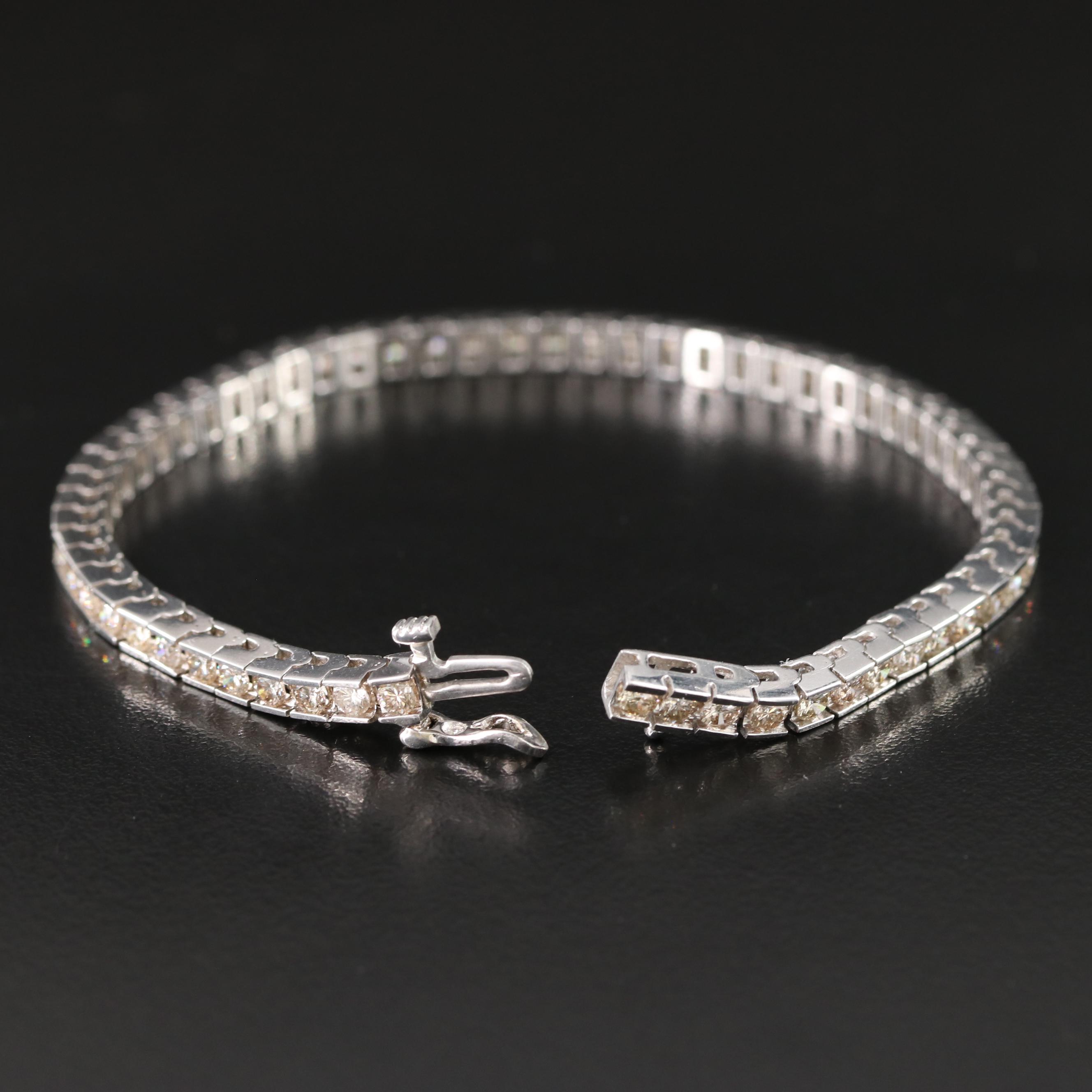 14K 5.04 CTW Diamond Line Bracelet with Fancy Color Diamonds | EBTH