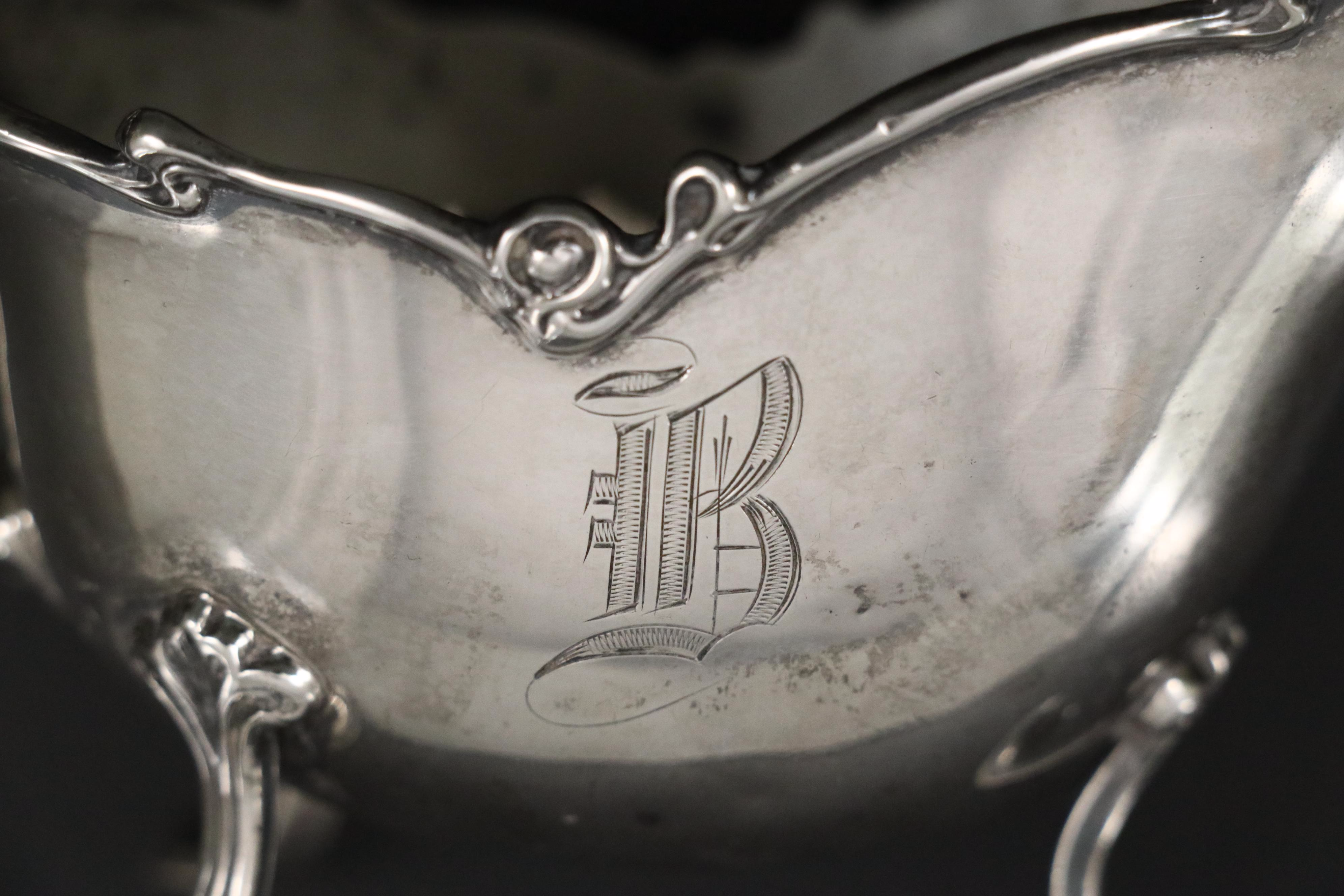 Unger Bros. "Alexander" Sterling Gravy Boat and Weighted Sterling Candlesticks | EBTH