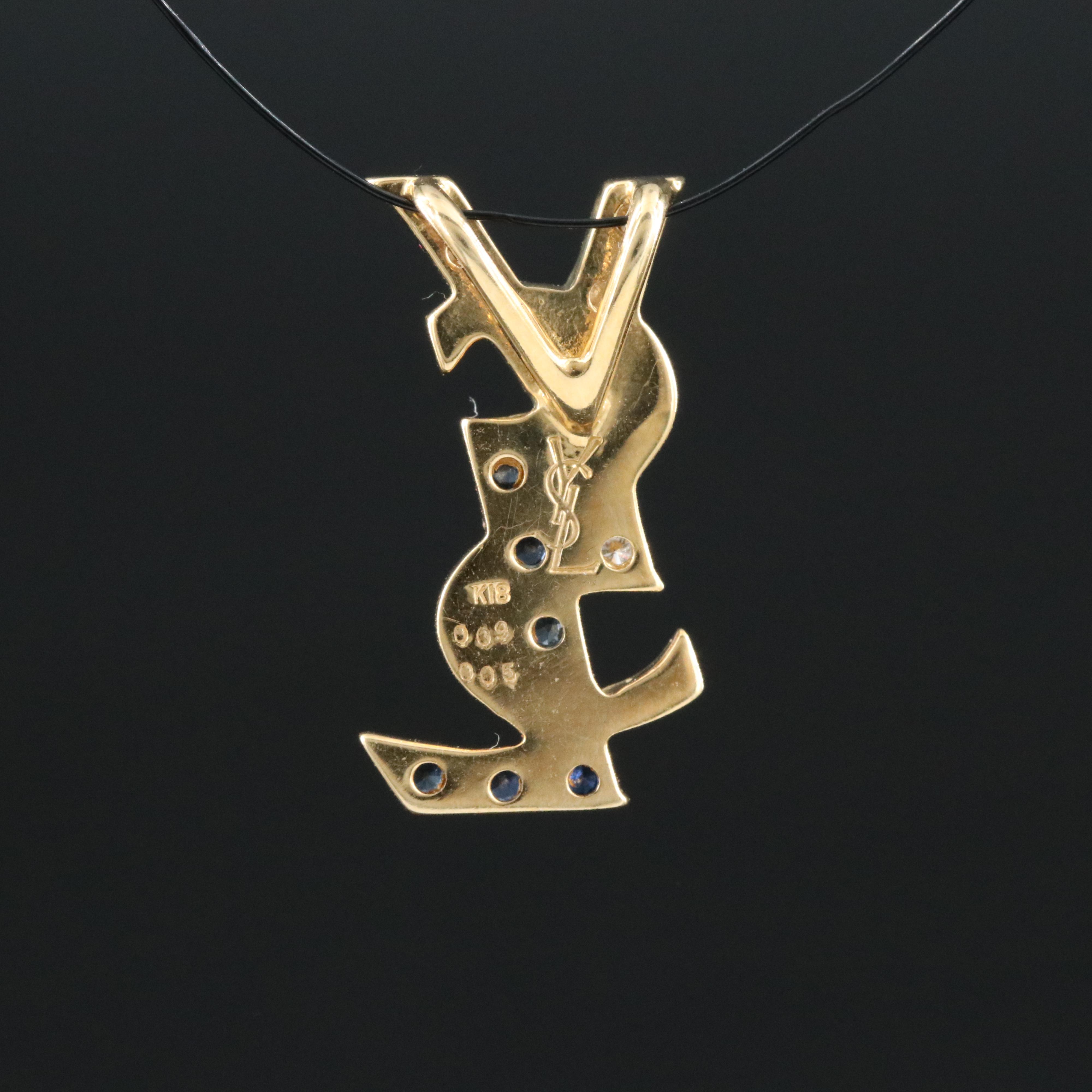Yves Saint Laurent 18K Sapphire and Diamond Logo Pendant | EBTH