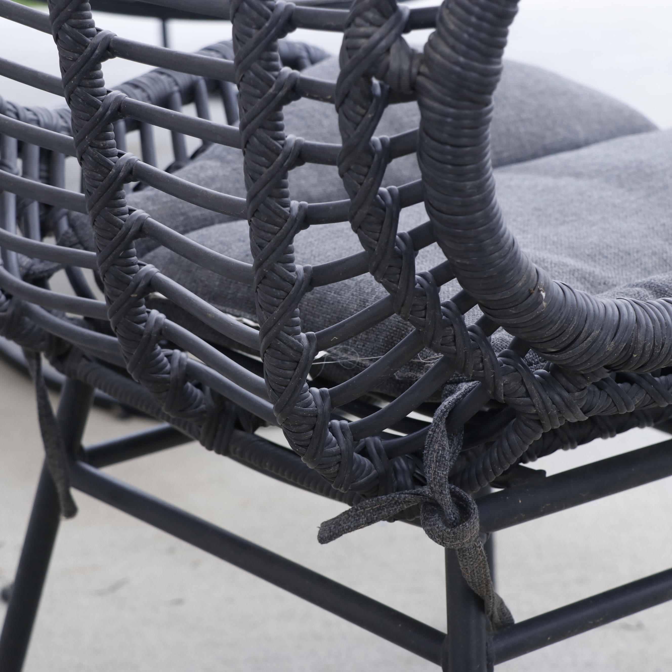 Uttermost "Coreene" Oval Coffee Table and Noble House PE Outdoor Club Chairs | EBTH