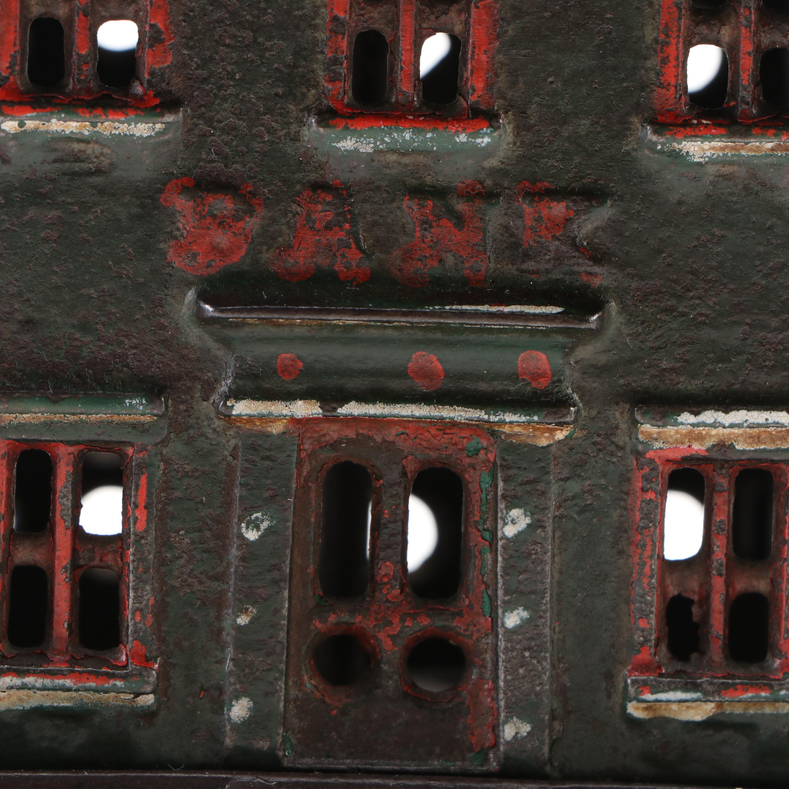 Cold-Painted Cast Iron Bank Building Coin Bank | EBTH