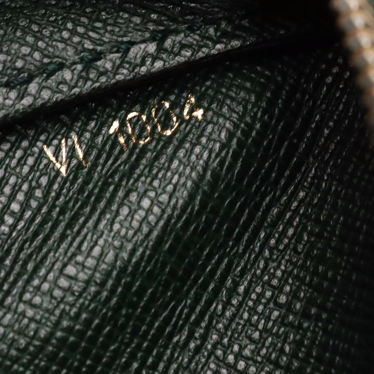 Louis Vuitton Pochette Baïkal Wristlet in Épicéa/Dark Green Taïga ...