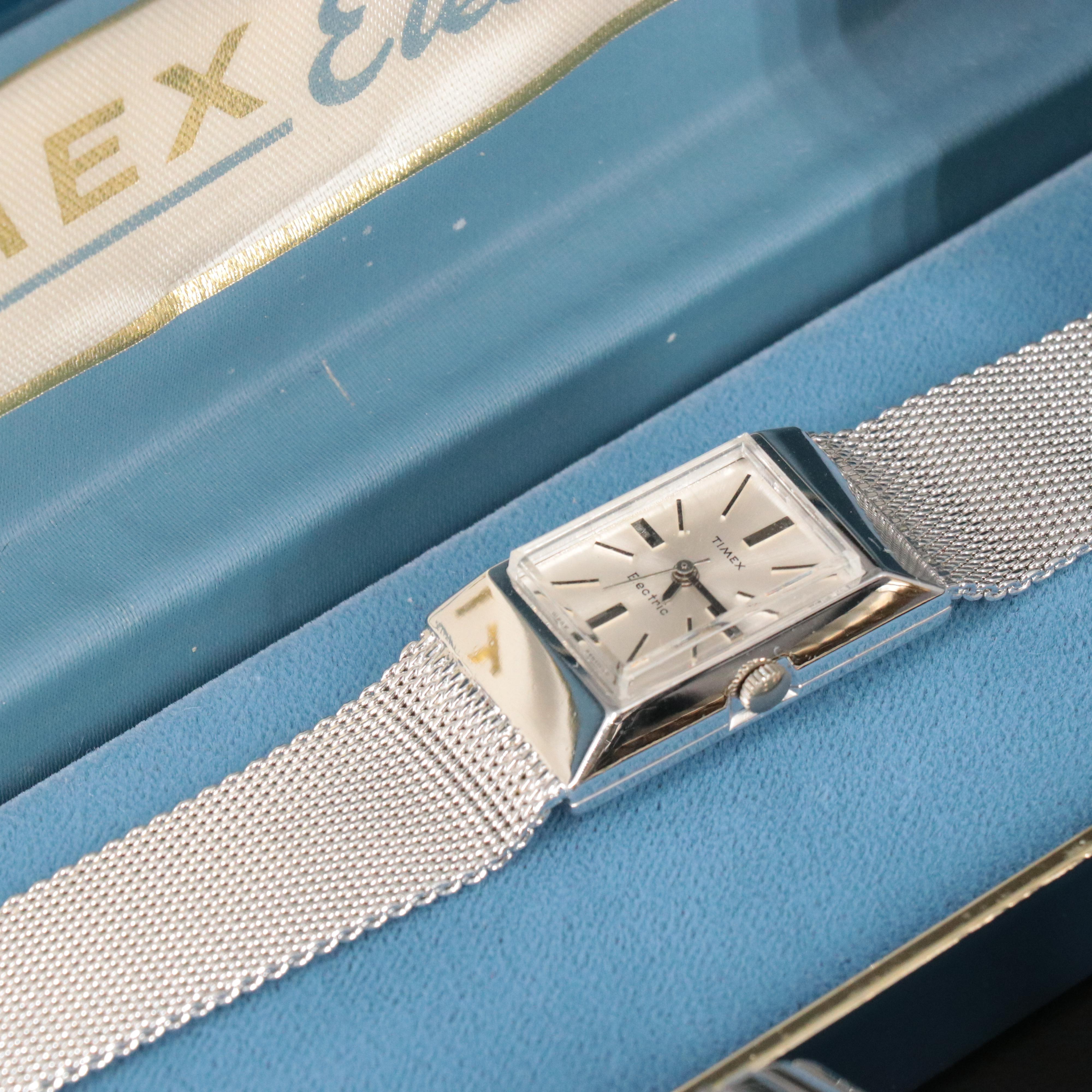 Collection of Timex Watches Featuring a Camera Desk Clock | EBTH