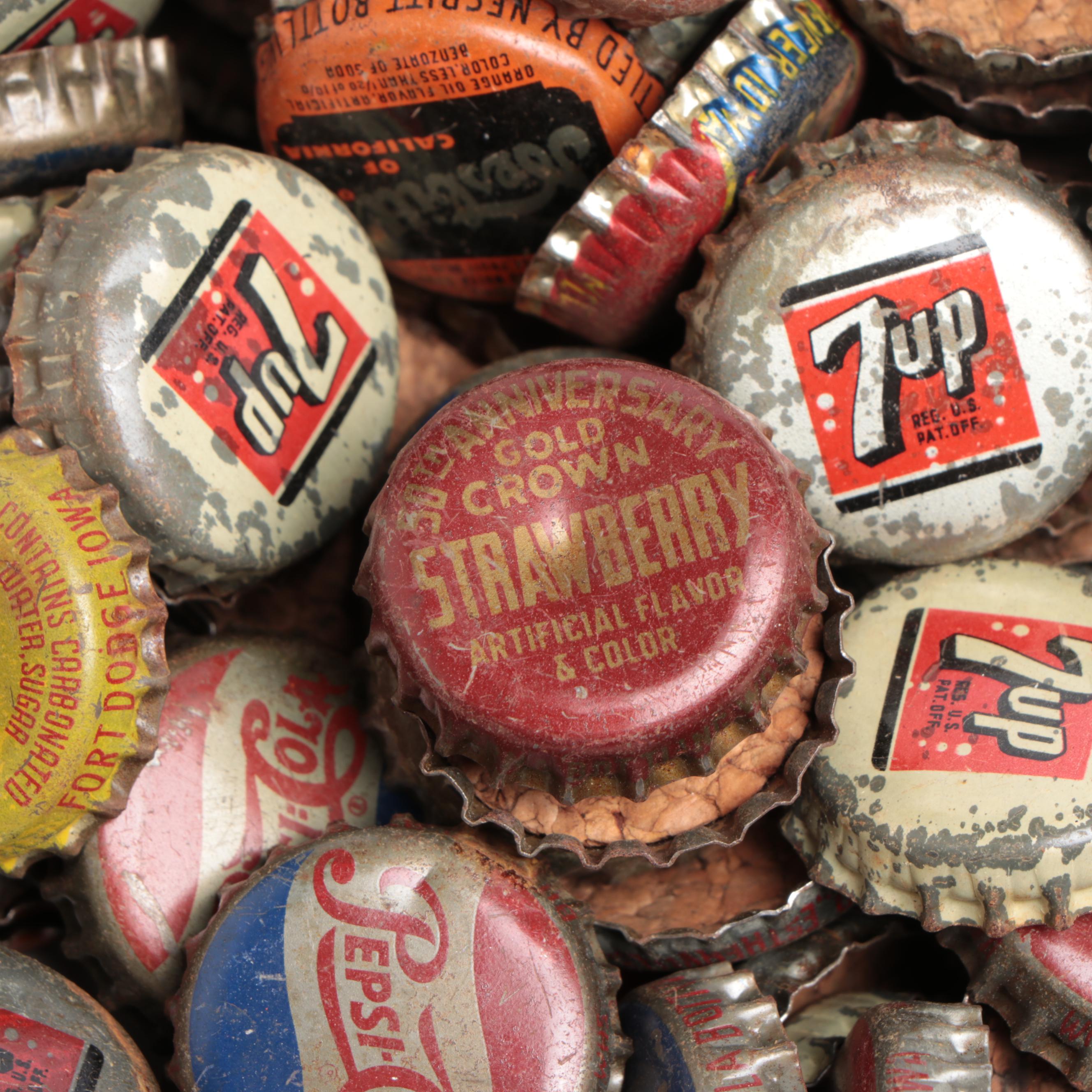 Collection of Bottle Caps Featuring Coca-Cola, 7UP, and Pepsi-Cola ...