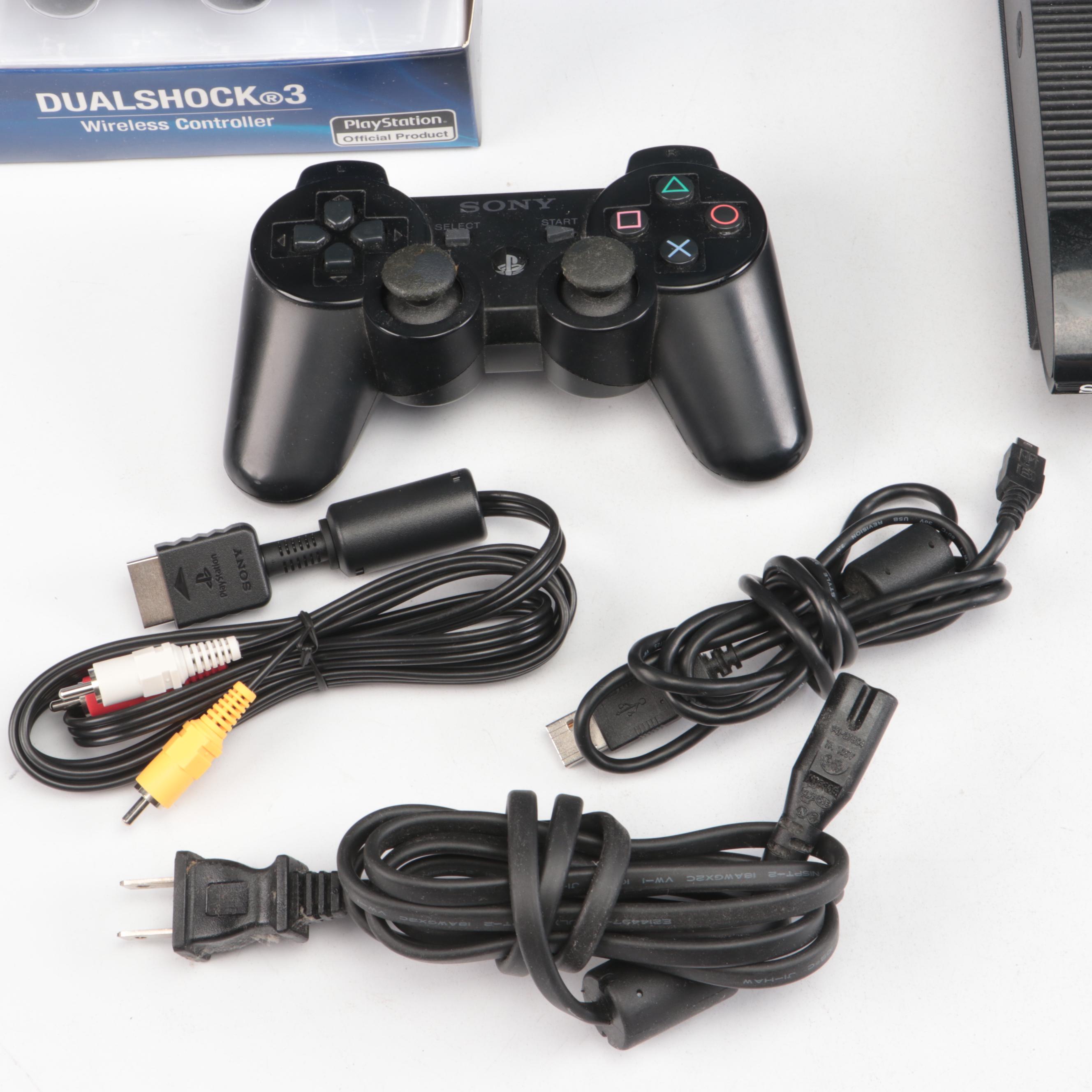 Sony PlayStation 3 with DualShock Wireless Controllers, Uncharted and ...
