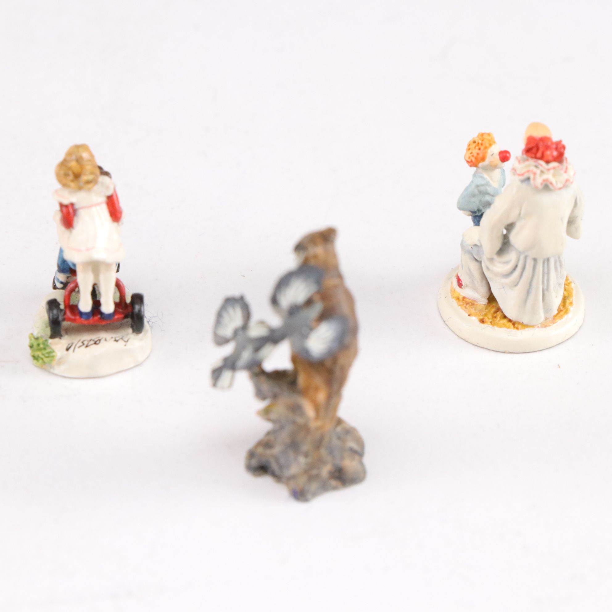 Miniature Goebel Figurines Including Olszewski with Display Dome | EBTH