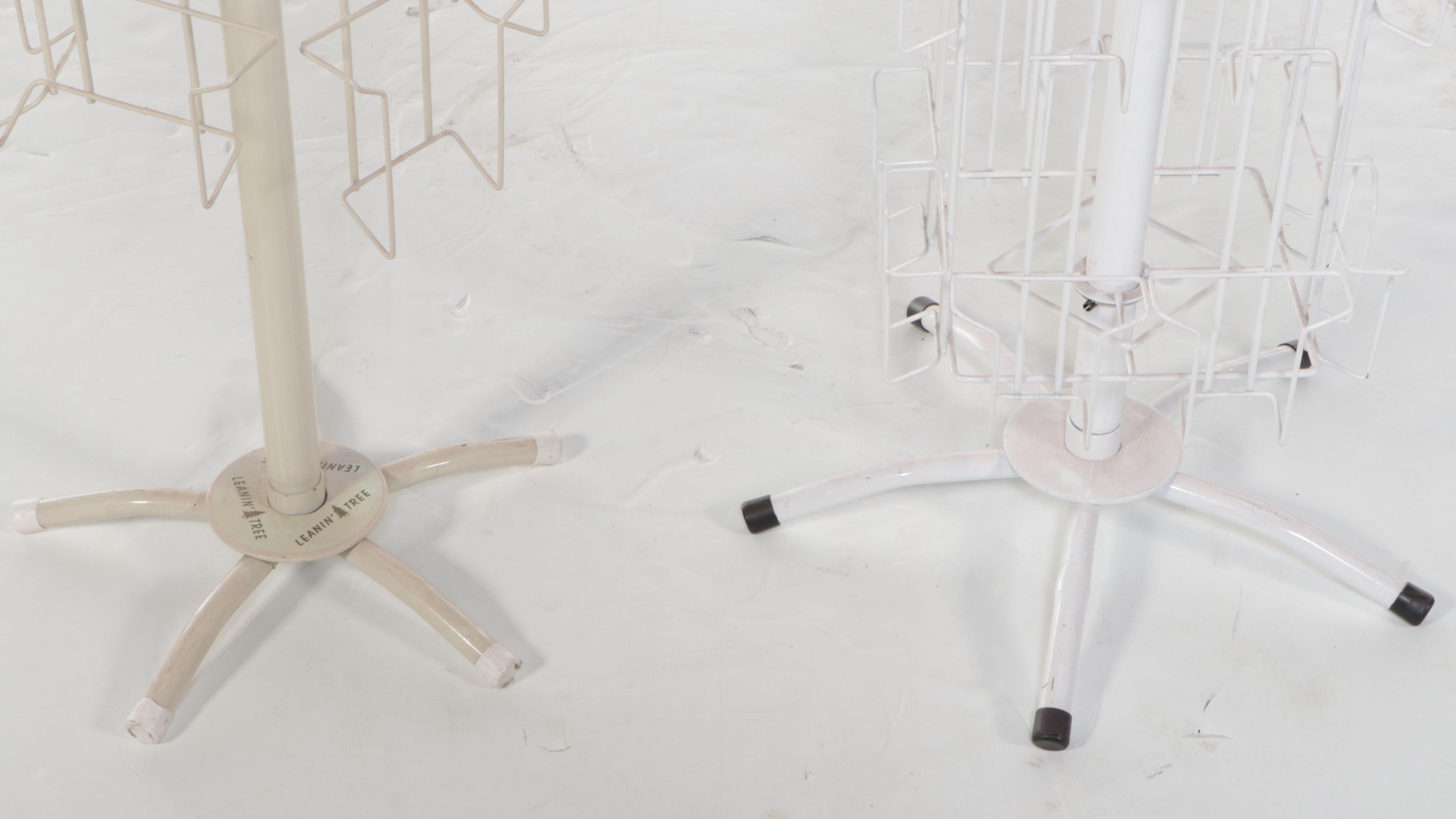 Leanin' Tree and Other Rotating Metal Display Rack | EBTH