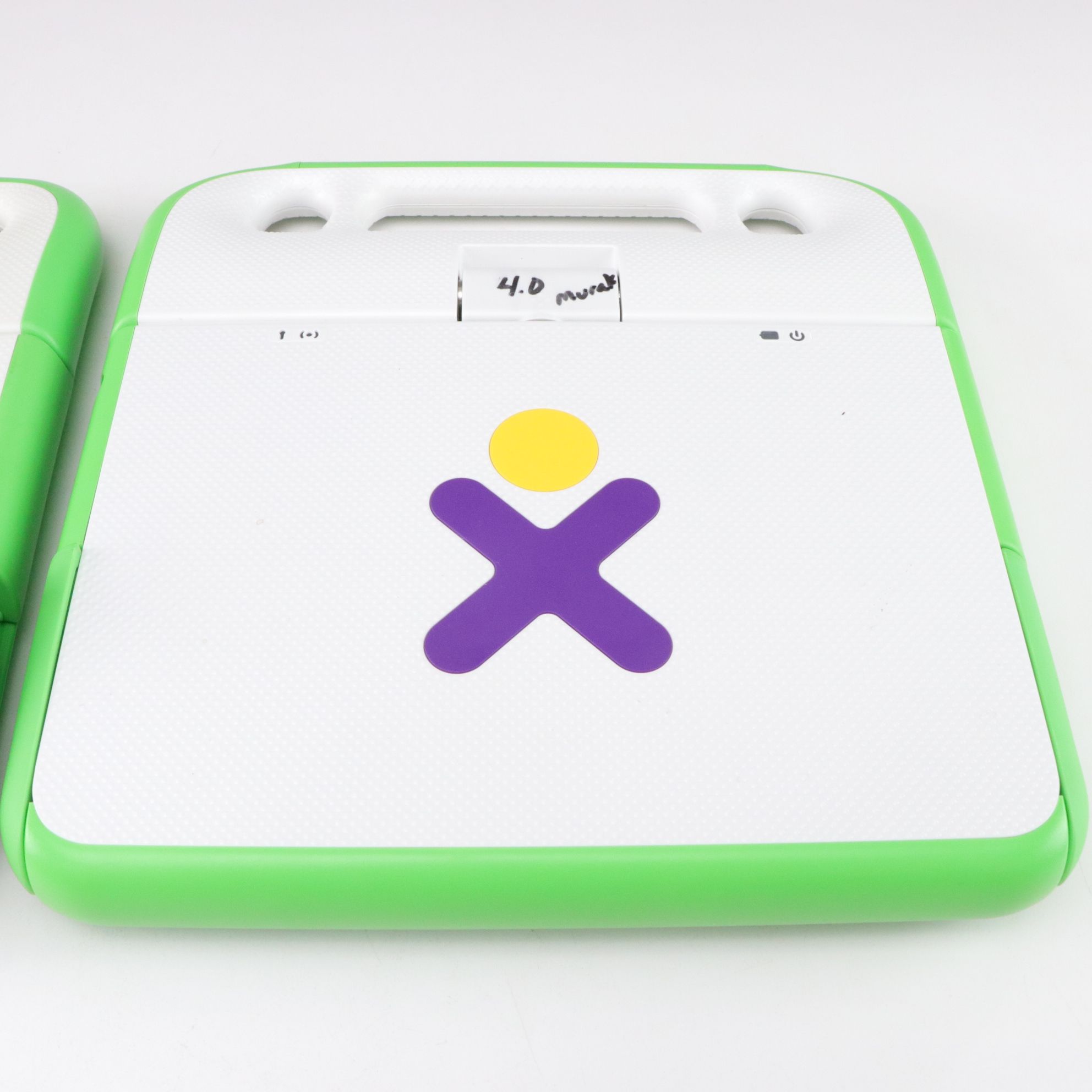 One Laptop Per Child XO-1 and XO-4 Computers with Freeplay Clamp ...