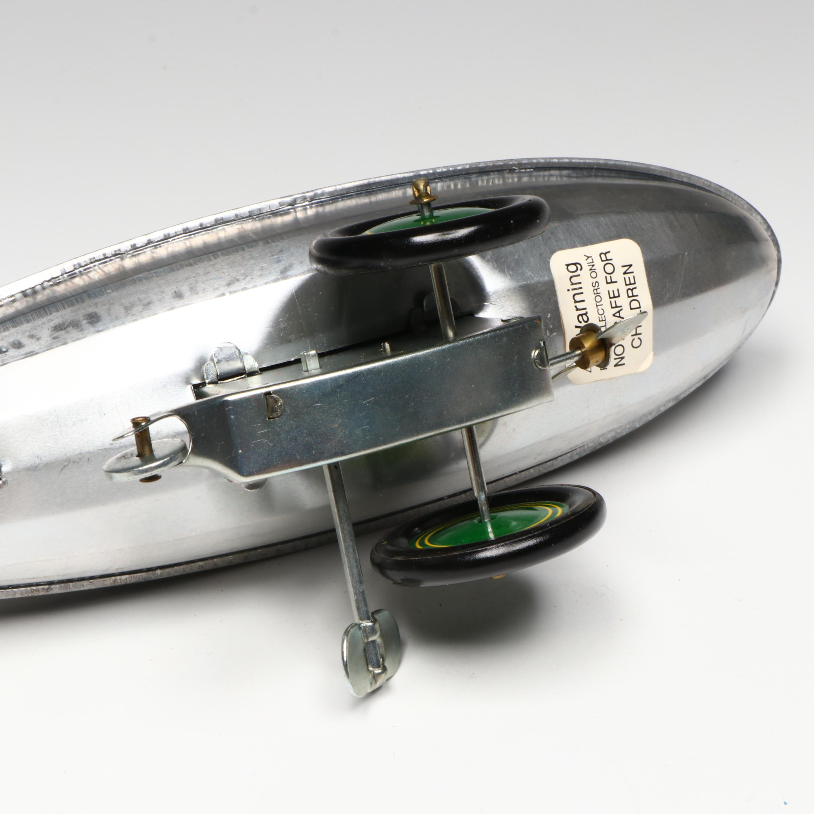 Vintage Strato Rocket Bank with Aluminum Zeppelin Replica Wind-Up Toy ...
