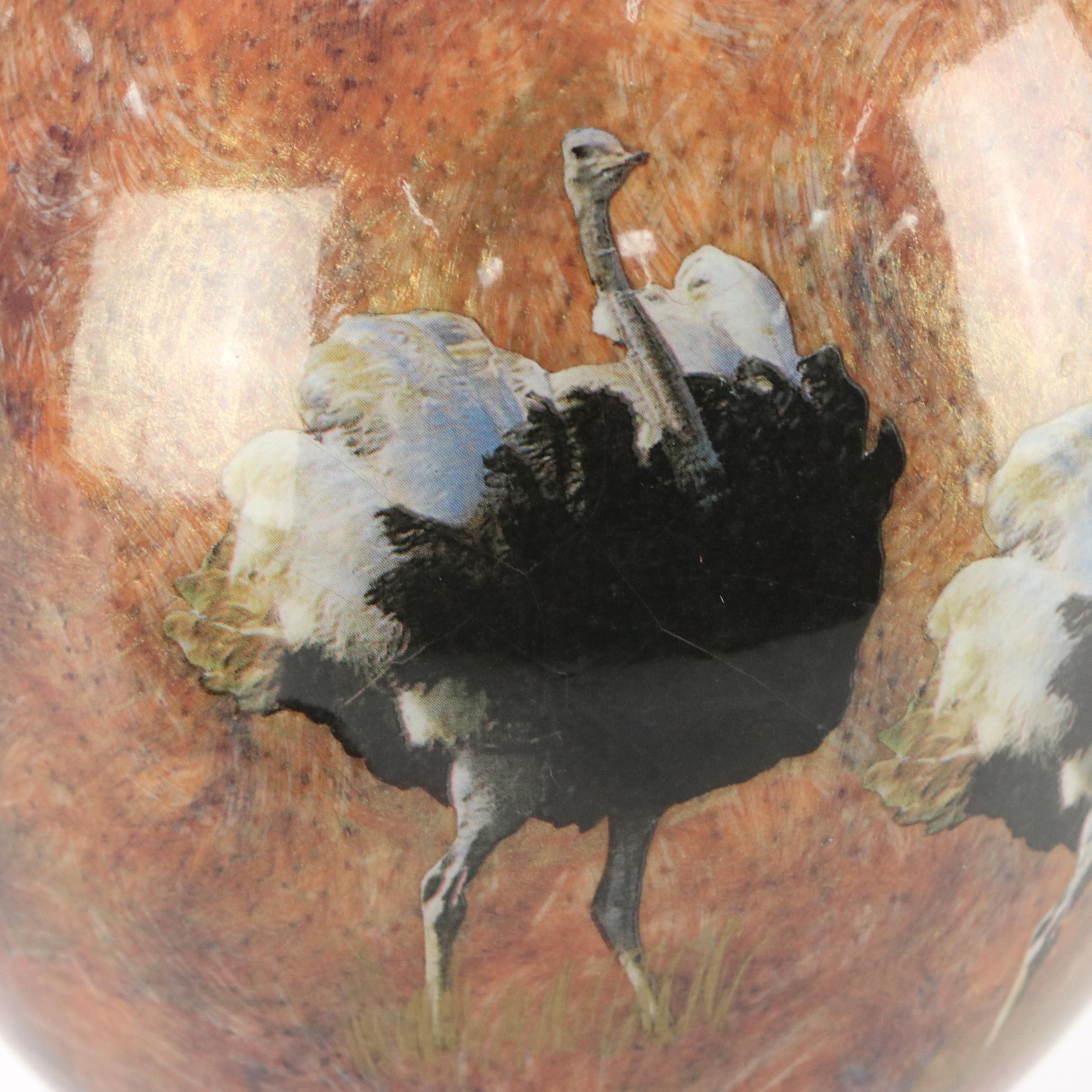 Leopard and Ostrich Porcelain Decorative Eggs on Wood Stands | EBTH