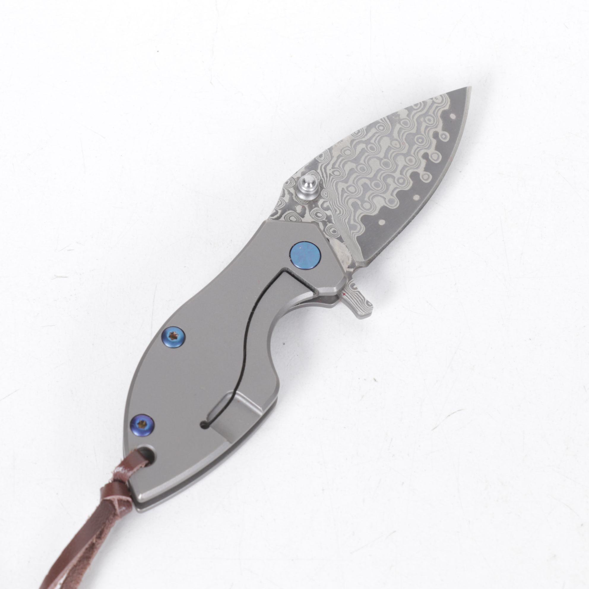 Chris Reeve Sebenza Folding Knife with Damascus Style Accents | EBTH
