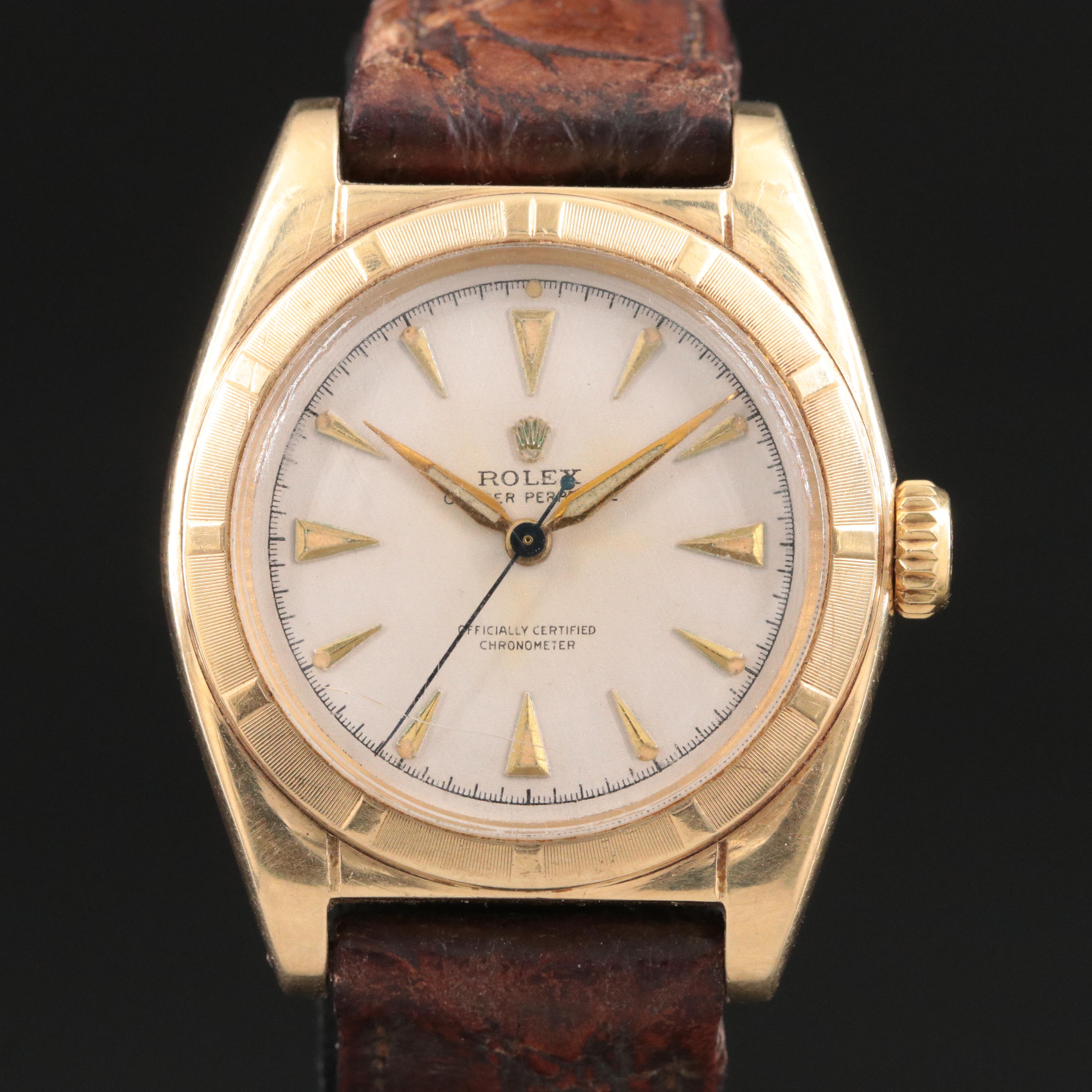 1948 Rolex Oyster Perpetual Bubble Back Engine Turned Bezel Watch | EBTH