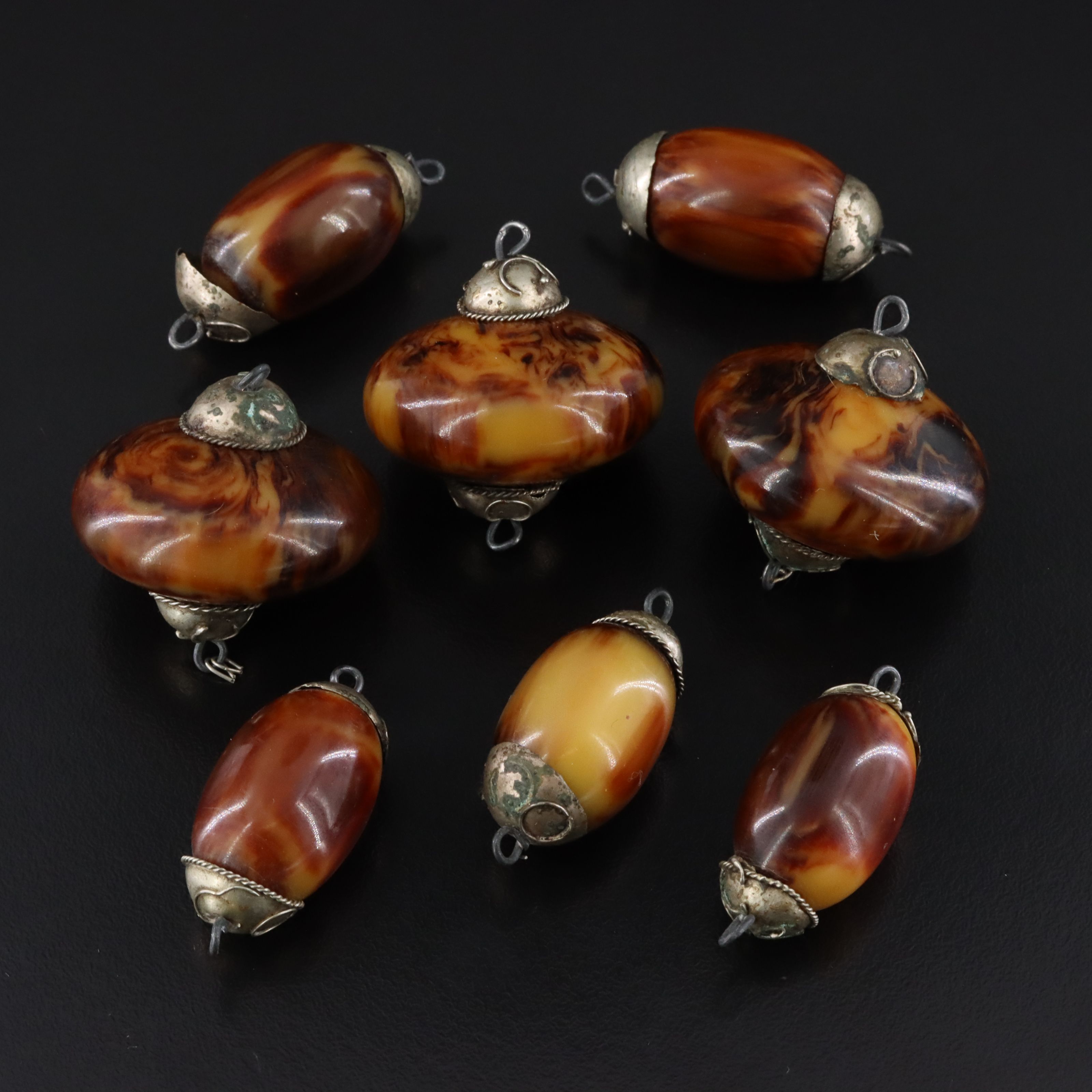 Vintage Marbled Bakelite Beads with Scroll Detail | EBTH